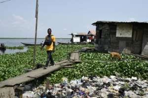 In poor Lagos district, 'slum party' brings hope and life