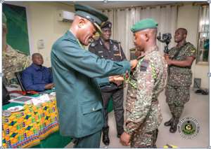 Comptroller General promotes brave immigration officer to the rank of ...