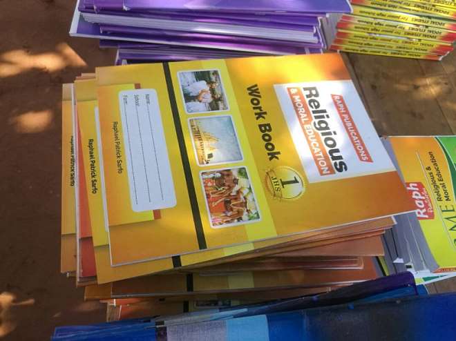 Patrick Sarfo donates books to Bruce J.H.S at Sekyeredumase