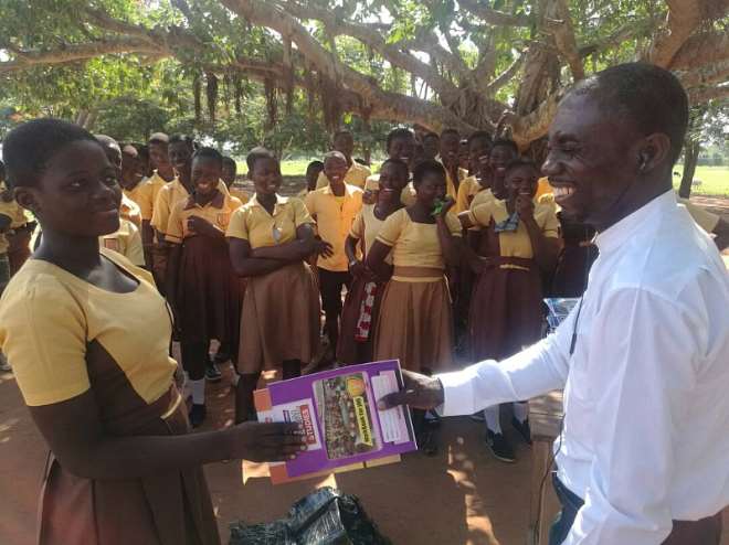 Patrick Sarfo donates books to Bruce J.H.S at Sekyeredumase
