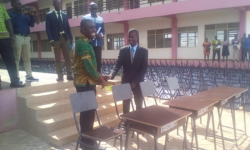 DCE Donates 500 Dual Desks To Gomoa Gyaman Community SHS