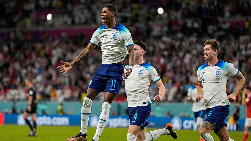 2022 World Cup: Rashford double sees England top group as Wales exit