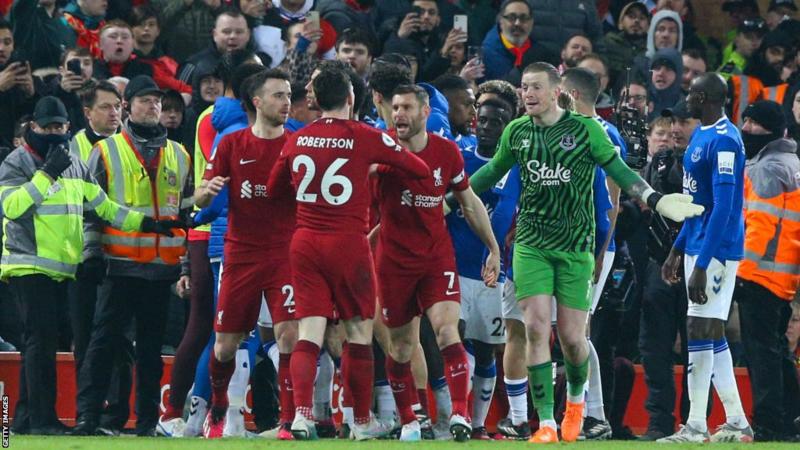 Liverpool and Everton charged over 'mass confrontation' in Merseyside derby