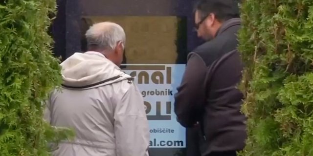 Living tombstones: Interactive graves that play videos and music