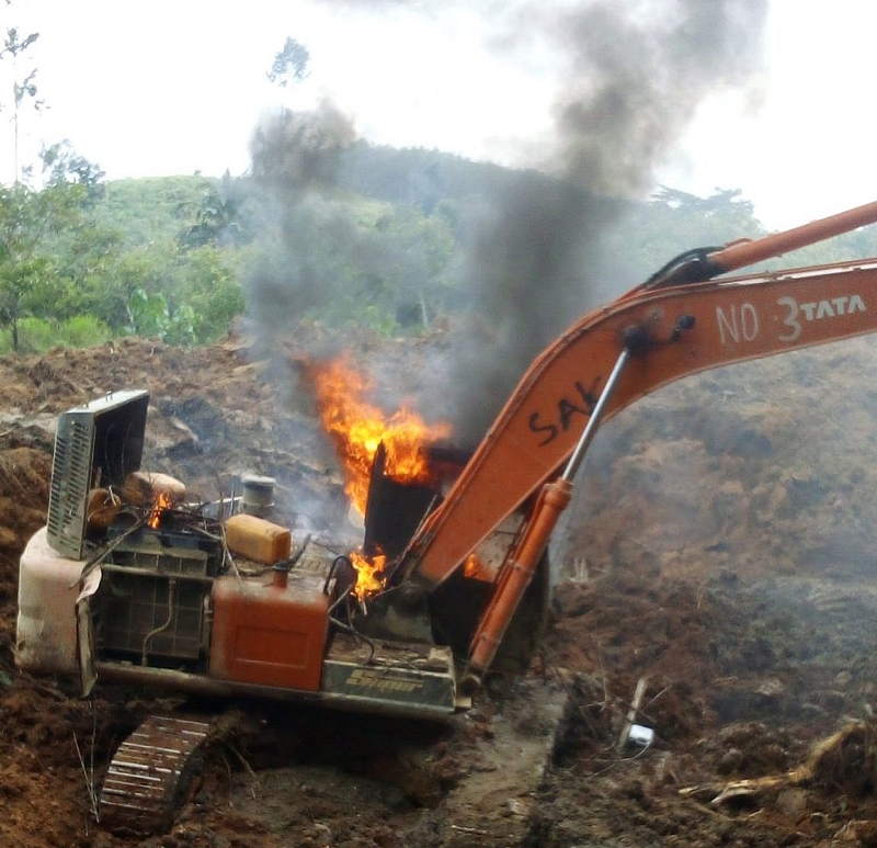 Mpohor DCE, community members burn excavator, handover 3 galamsey operators