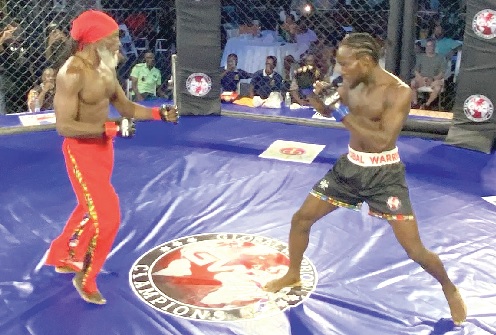 Reggie Rockstone floors young fighter in MMA thriller
