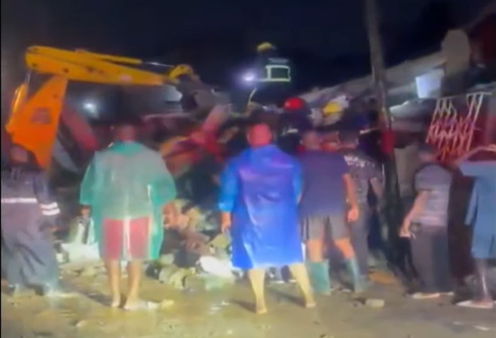 One dead, two children trapped after three storey building collapse at ...