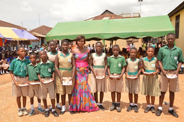 Sasso gives school children in three regions free exercise books, pens
