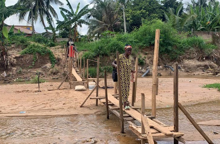 The weak footbridge serves as a death trap for the residents ...