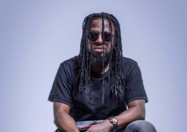 Video/Photos: Guru Unveils New Hairstyle, New Music Video
