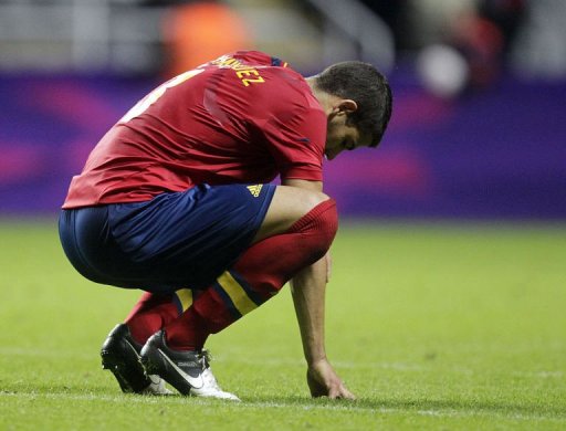 Football giants Spain crash out of Games