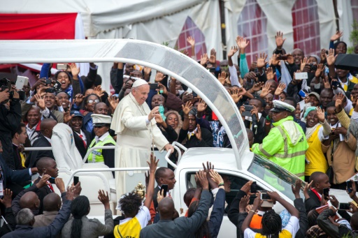 Huge crowds as pope celebrates first mass in Africa