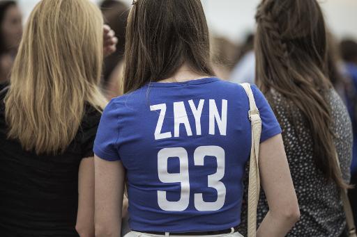 One Direction plays on in S.Africa as fans mourn Malik's exit