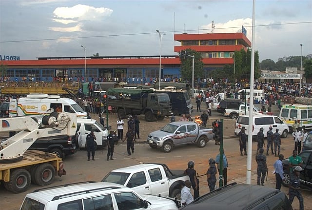 Security personnel experience tough time controlling crowd at Melcom site