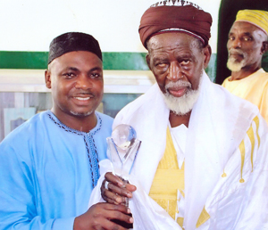 Issa Monnie Celebrates Award