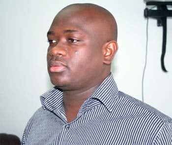 Mills Hangs Stan Dogbe