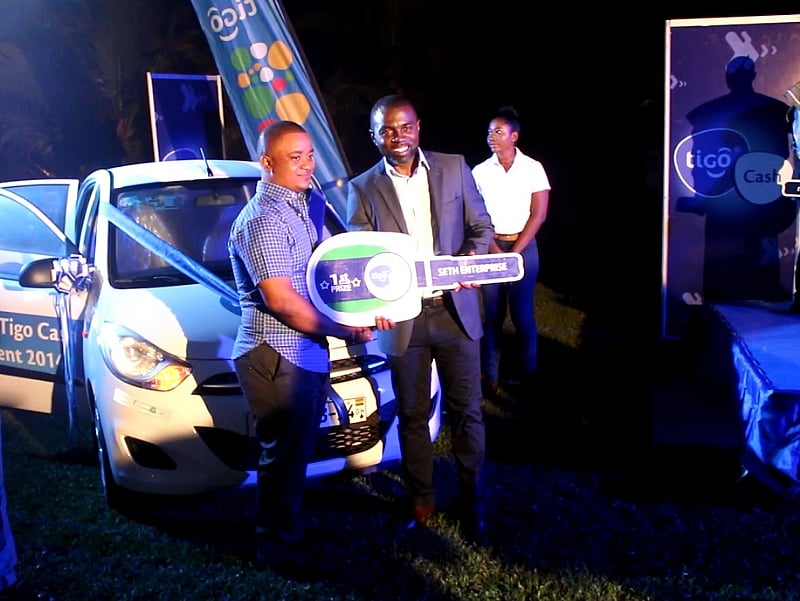 Tigo gives away 3 vehicles at it first mobile financial service agents ...