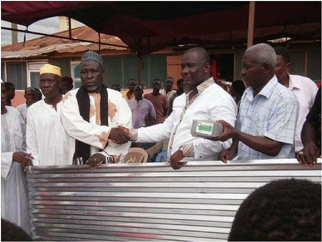 Member of Parliament donates roofing sheets to disaster victims