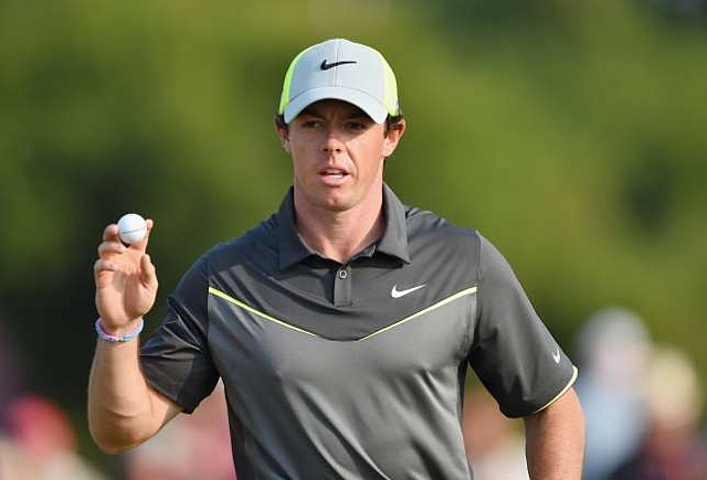 Rivals hopeful of catching The Open leader Rory McIlroy