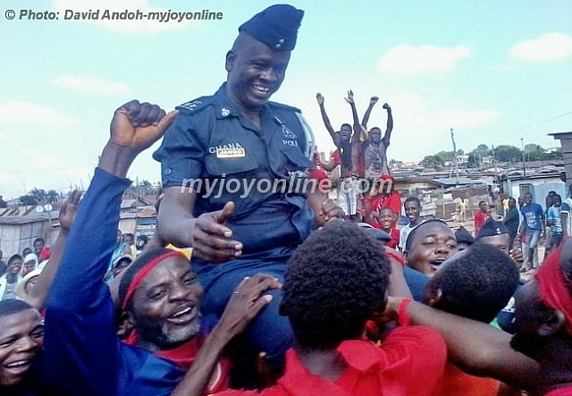 Photo of the Week: When a mob carry a policeman, it means peace
