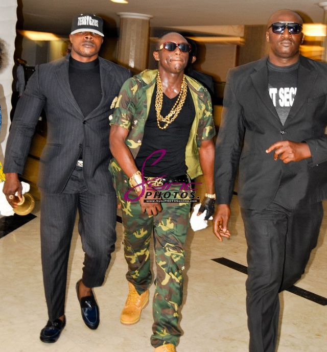 TERRY G MOVES AROUND WITH BODY GUARDS WITH ARMY UNIFORM [PICTURES]
