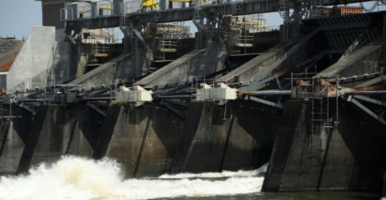 Liberia hydro plant powers businesses left in dark by war