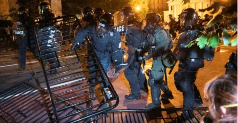US foes delight in criticizing US as protests flare