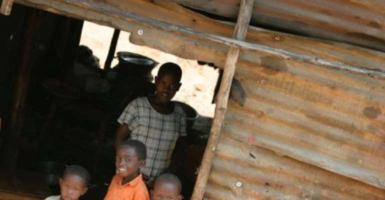 Rwanda says slashed poverty rate in five years