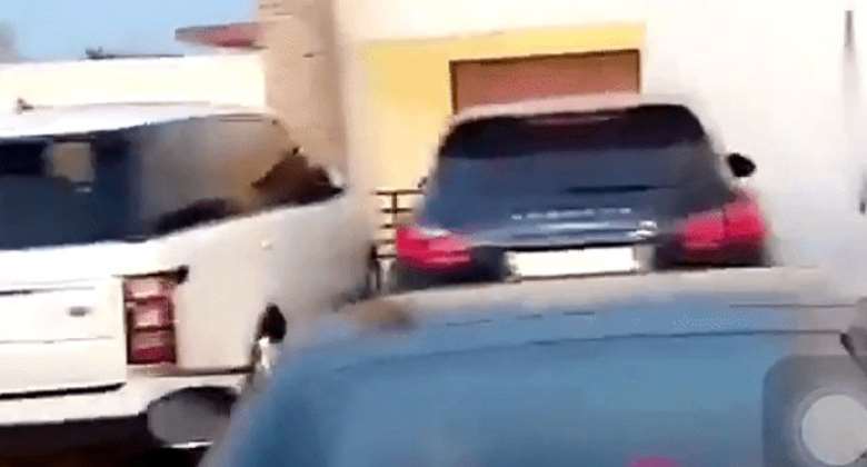 Shatta Wale flaunts remote control gate, fleet of cars in latest video