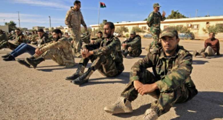 Both sides in Libya conflict accept ceasefire