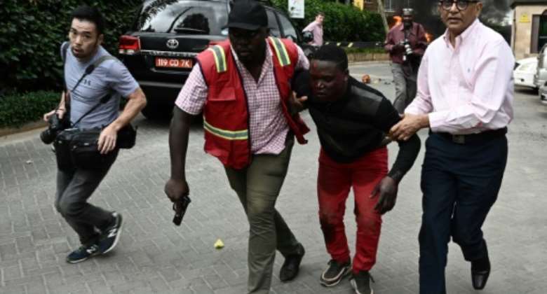 Blast, gunfire in attack at upmarket Nairobi hotel complex