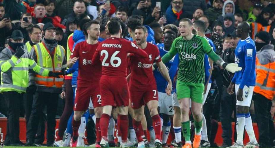 Liverpool and Everton charged over 'mass confrontation' in Merseyside derby