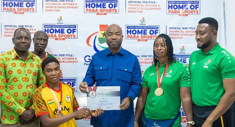 Para Athletes present medals to NPC President Samson Deen
