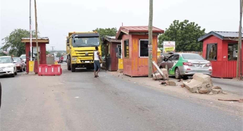 Residents want Afienya container toll booth removed as it poses danger ...