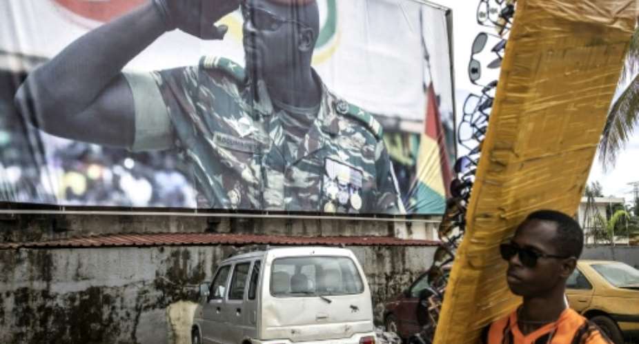 In Guinea vote, victory all but assured for junta strongman
