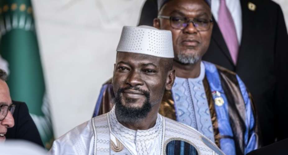 Guinea authorities say Doumbouya is healthy despite absence