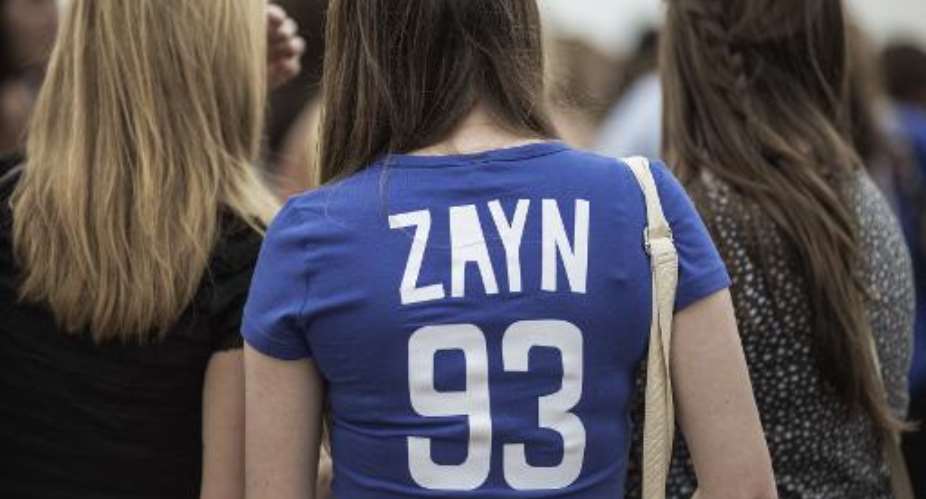 One Direction plays on in S.Africa as fans mourn Malik's exit