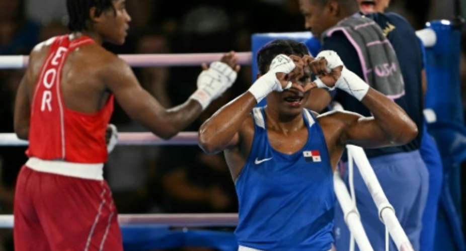 Boxer Ngamba wins first medal for Refugee Olympic Team