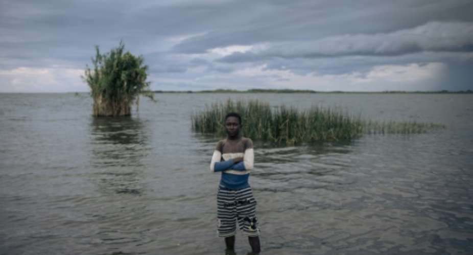 East DR Congo fishing town struggles as checkpoints, militias proliferate