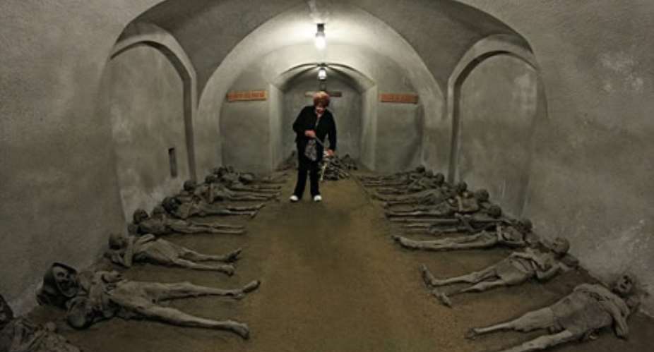 Church puts on display monks preserved with their robes and rosaries