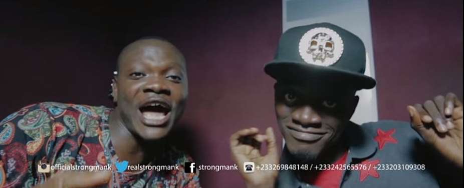 *Liwin stars in Strongman K's Am The Strongman music video